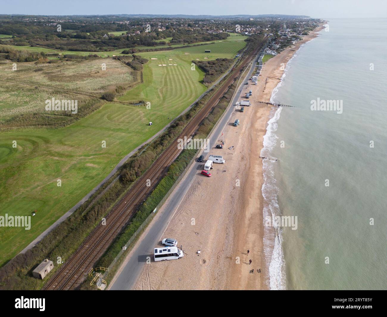 aerial view of the railway line and golf course along cooden beach in ...