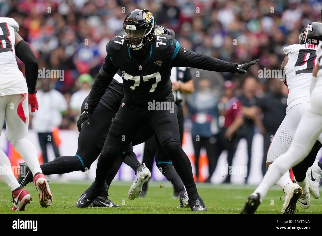 Jacksonville Jaguars offensive tackle Anton Harrison (77) in action ...