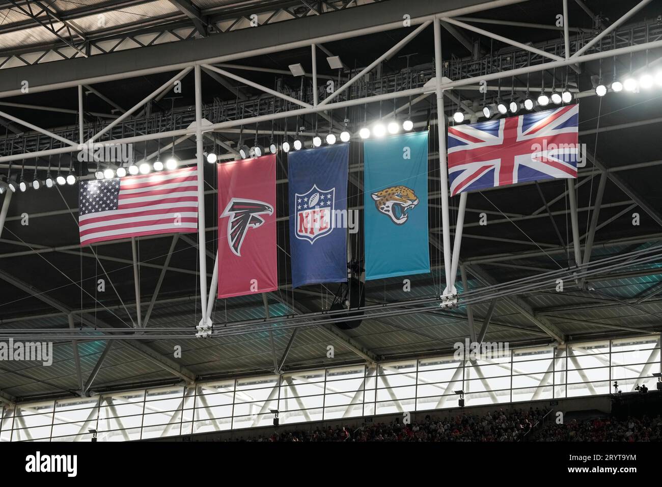 Flags are displayed at the top of the stadium during an NFL football ...