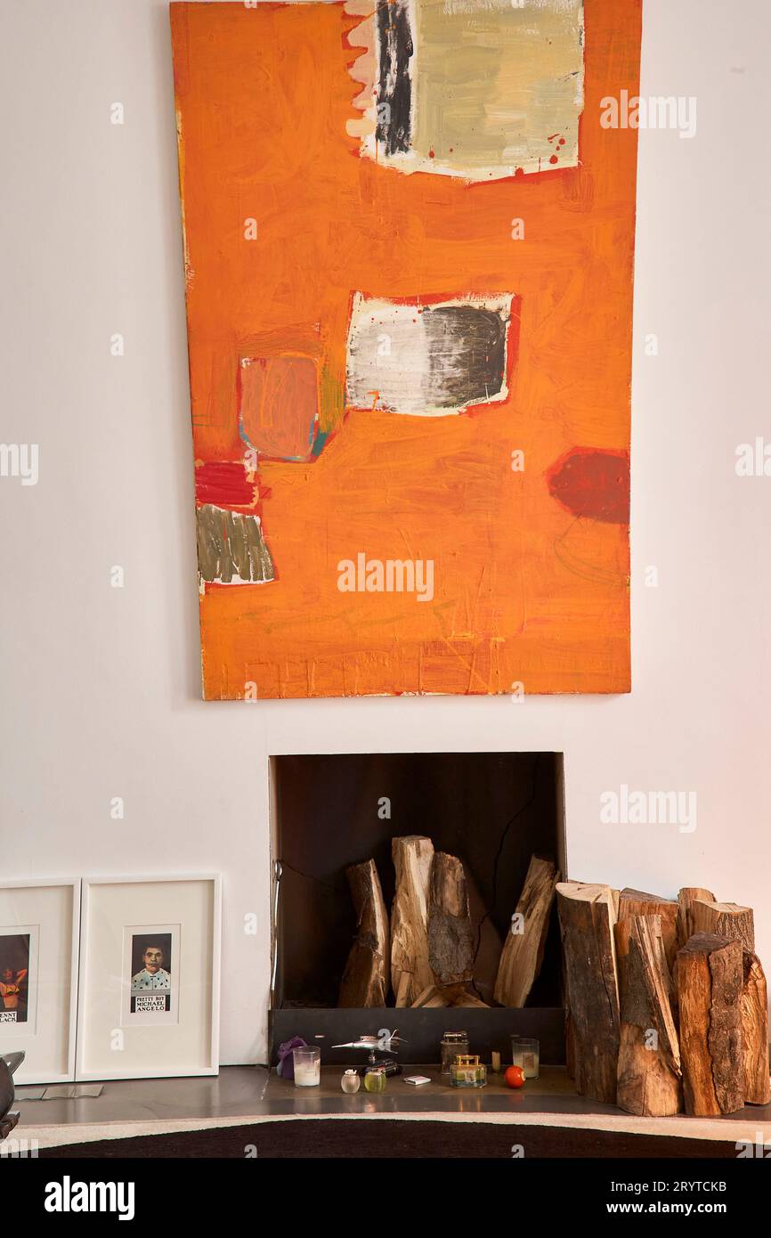 Ground floor sitting room plain white fireplace and artwork. End House ...