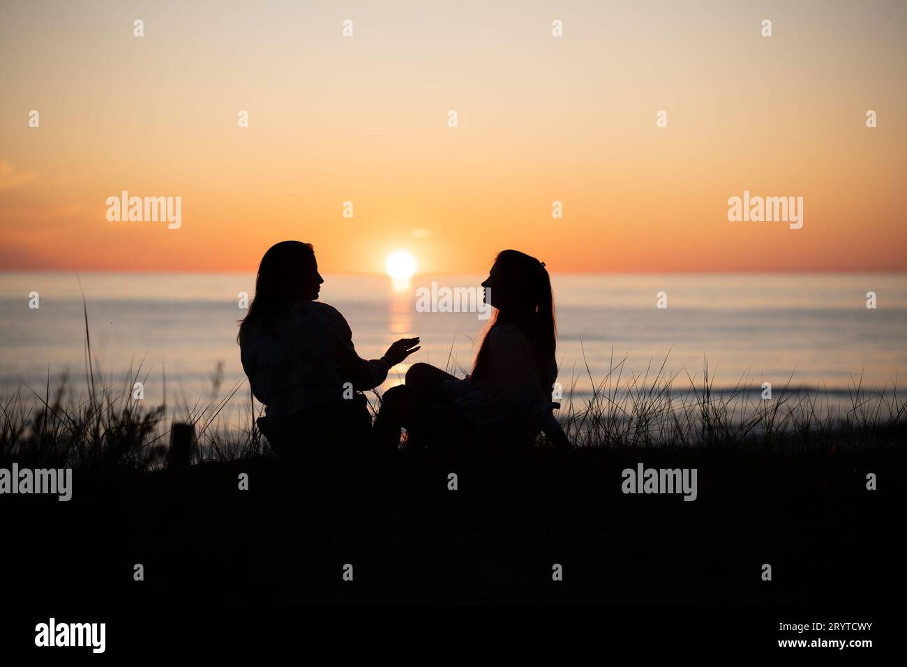 Watching sunsetting hi-res stock photography and images - Alamy