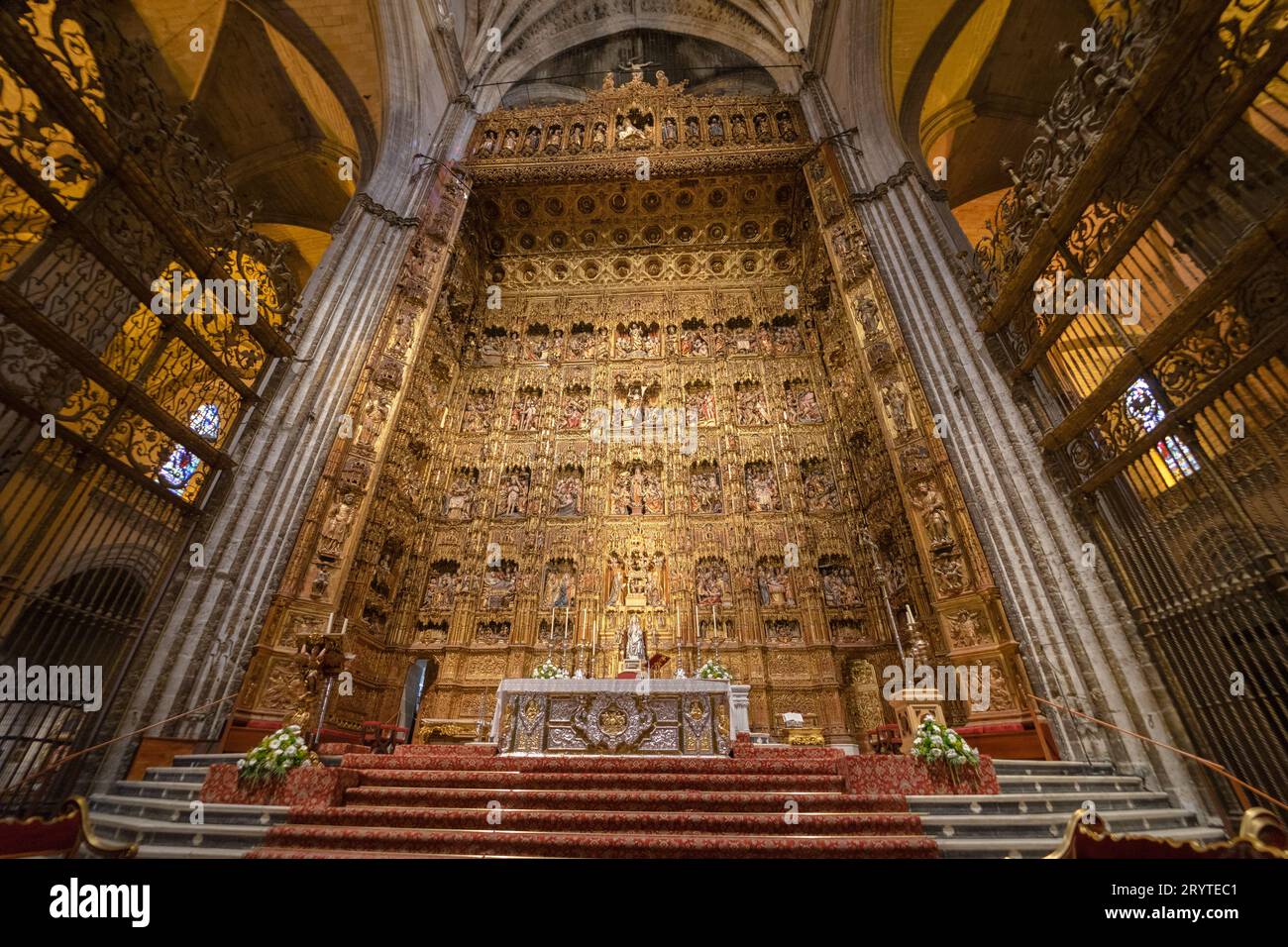 Impressive gold construction of the altar of the cathedral of Seville ...