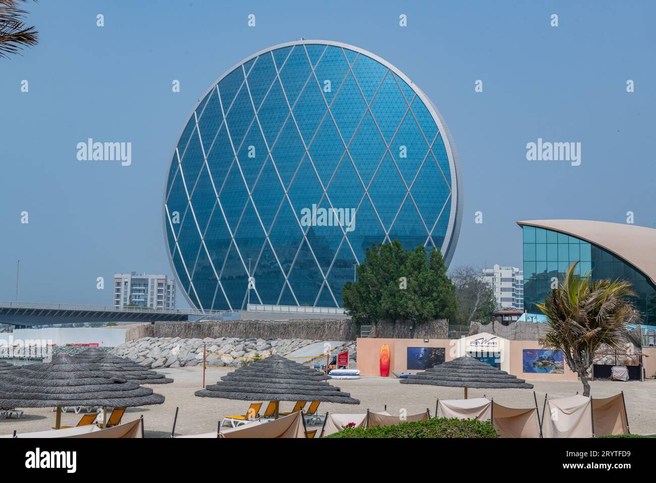 The Aldar Head Quarters Building in the shape of a disk with a height ...