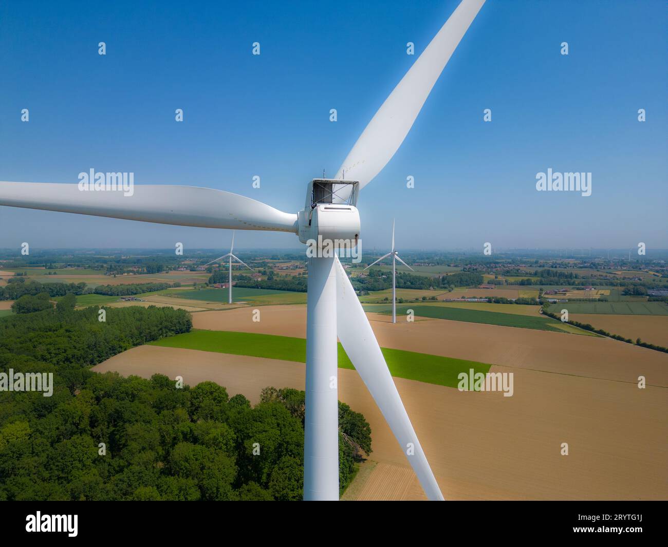 Close to the turbine. Wind turbine from aerial view - Sustainable ...