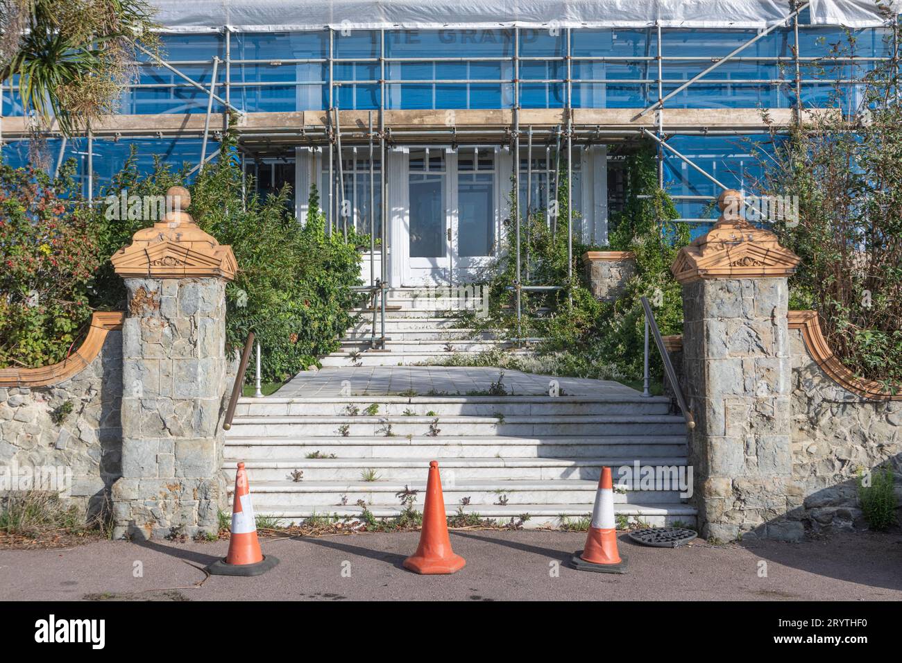 The overgrown entrance to the Grand Hotel, Folkestone with scaffolding ...