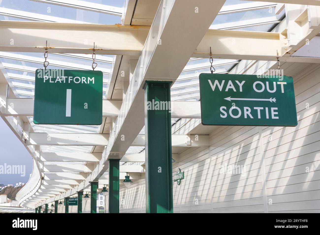 Two signs hanging in Folkestone's renovated Harbour Arm railway station ...