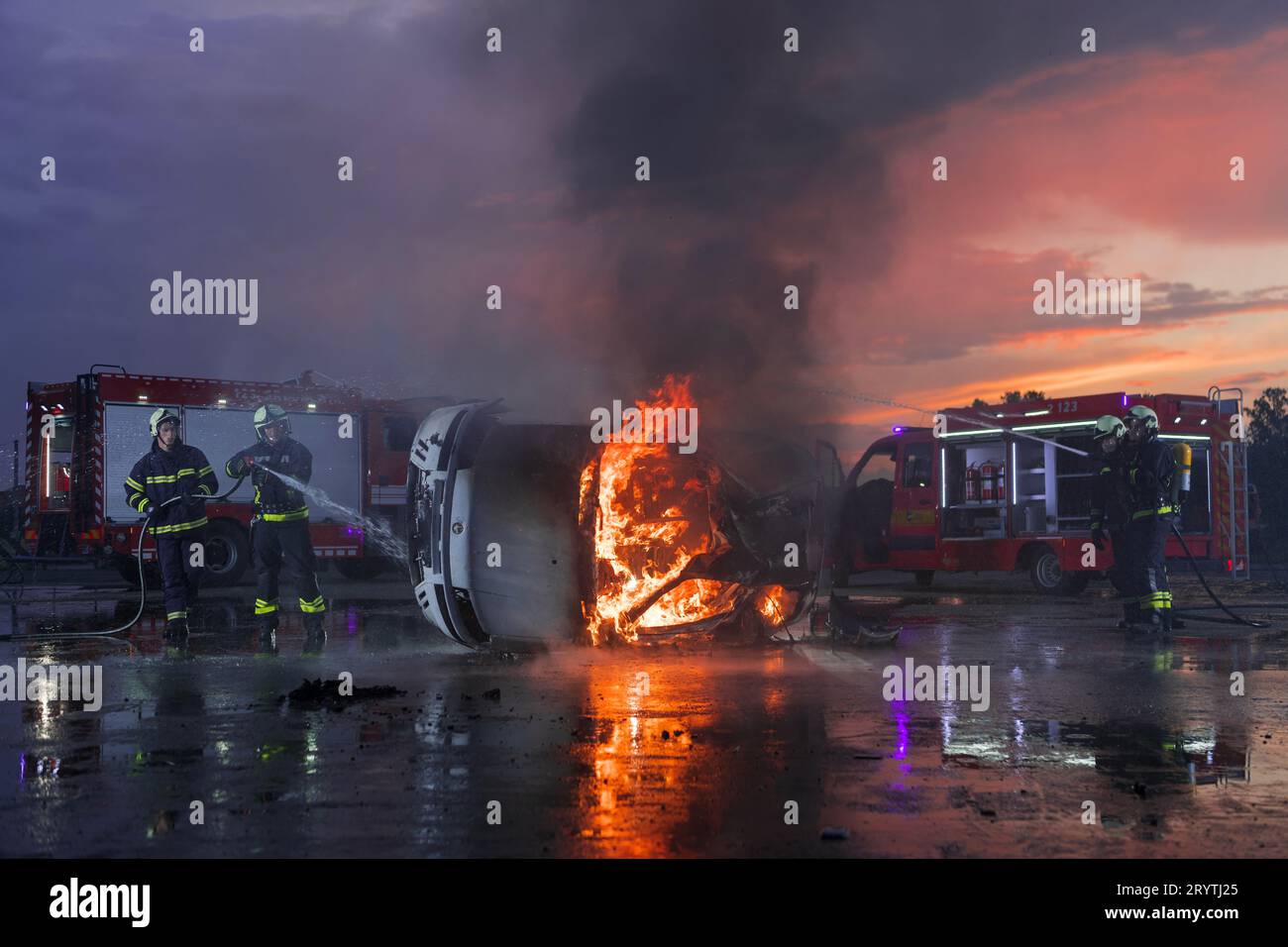 Firefighters fight fire flame control hi-res stock photography and ...