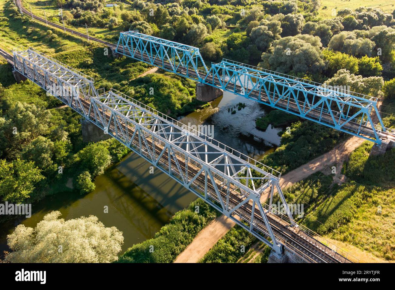 Metal structure of railway bridges over the river, aerial view Stock ...