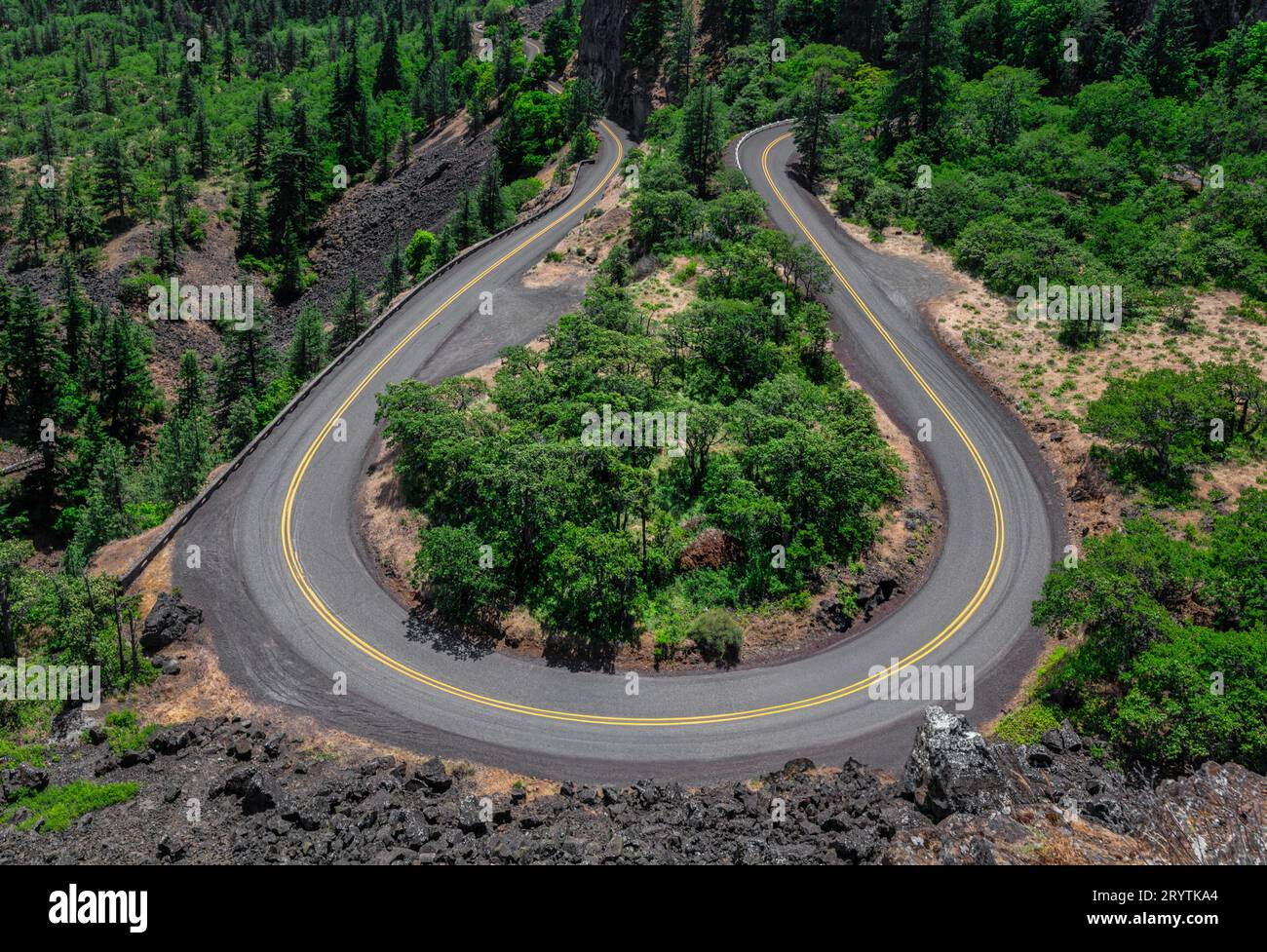 An aerial view of a scenic curving road in the Columbia Gorge of Oregon ...