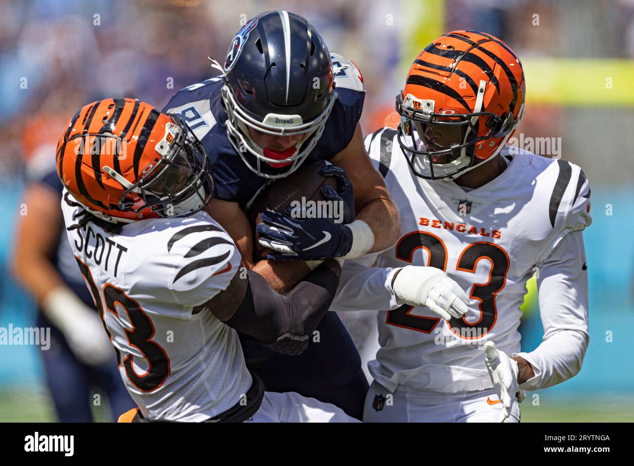Tennessee tight end Josh Whyle (81) is tackled by Cincinnati safety ...