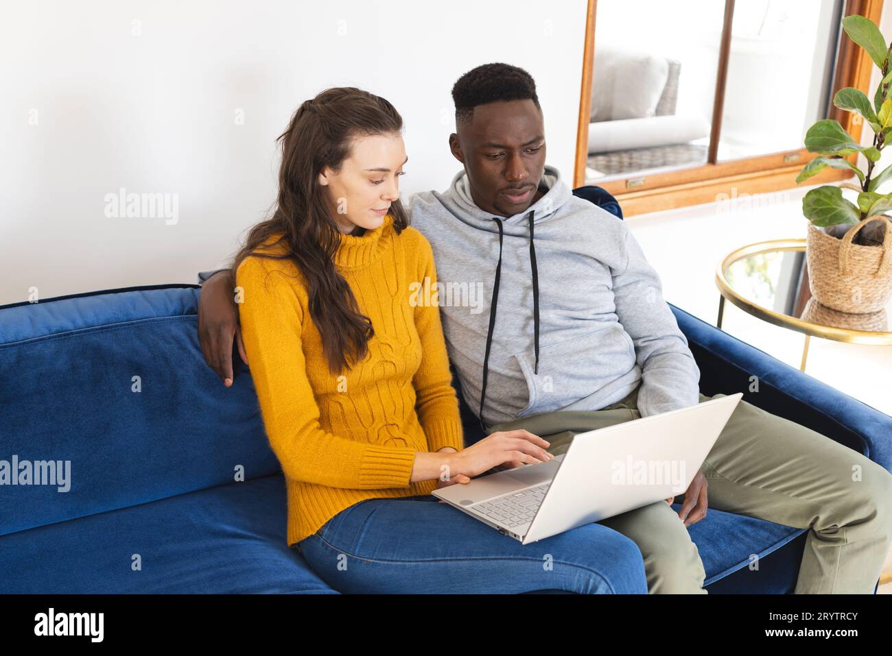 Diverse person on laptop hi-res stock photography and images - Alamy