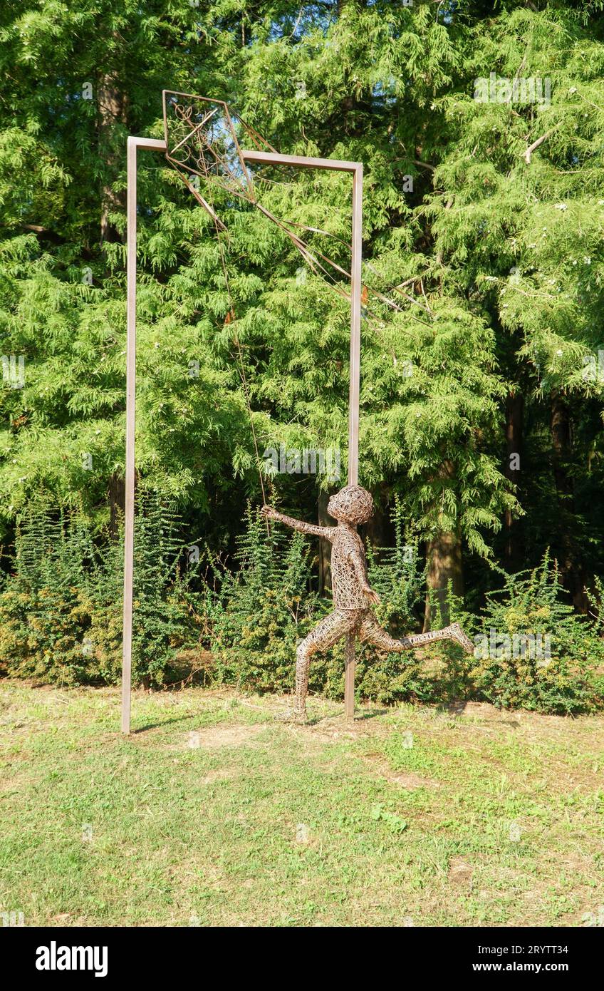 Statue of a child running with a kite at Bosco Taxodi (Forest Park ...