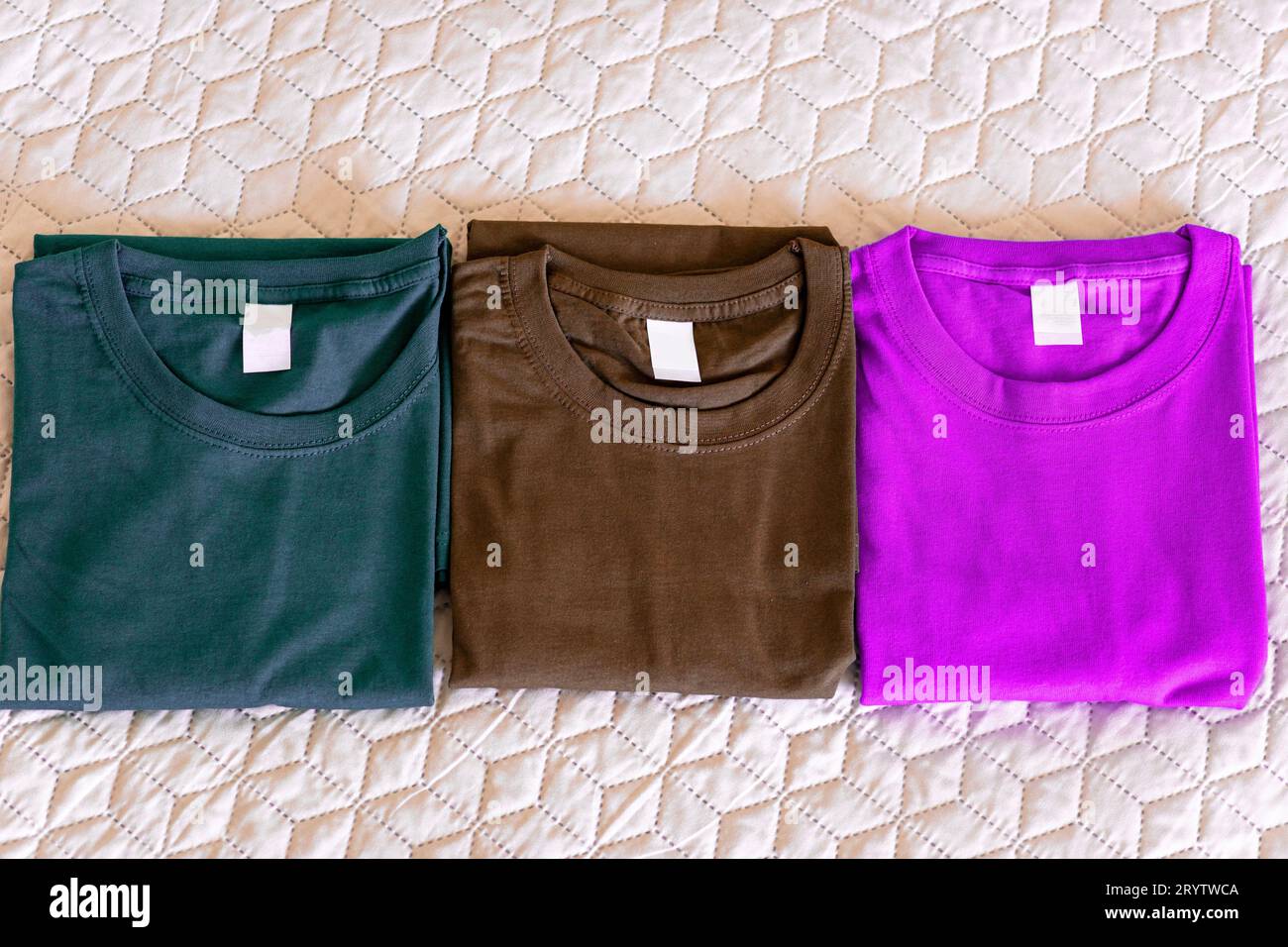 Stacked folded shirts hi-res stock photography and images - Alamy