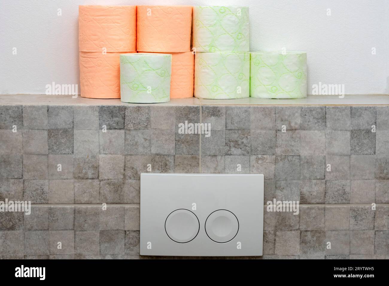 Toilet rolls and toilet button. Rolls of two colors. Rows of Toilet ...