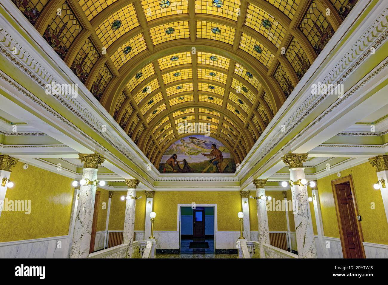 Stained glass arched skylight and mural on the second floor above the ...