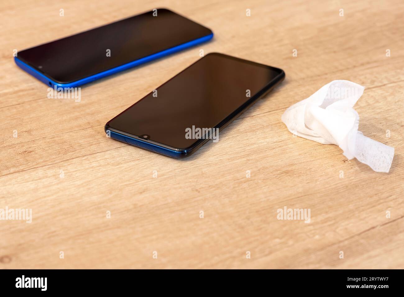Wet disinfectant wipe, napkin. Mobile phone. Concept for disinfection ...