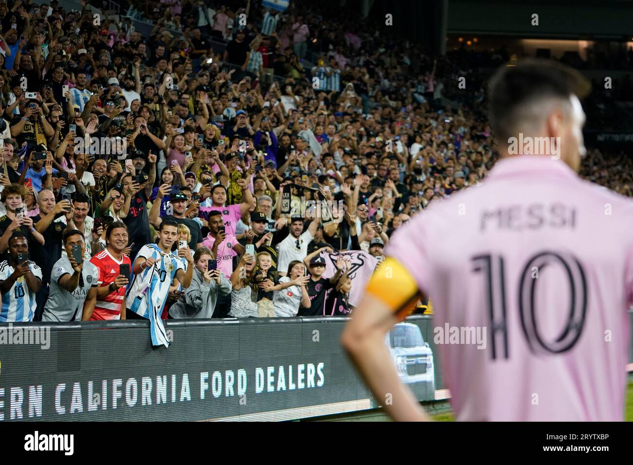FILE - Fans cheer as Inter Miami forward Lionel Messi (10) waits for a ...