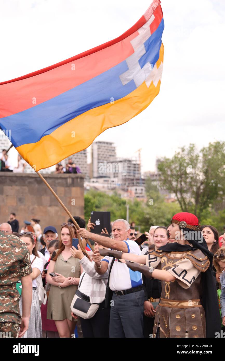 Crowd cheering holding flag smiling unity hi-res stock photography and ...