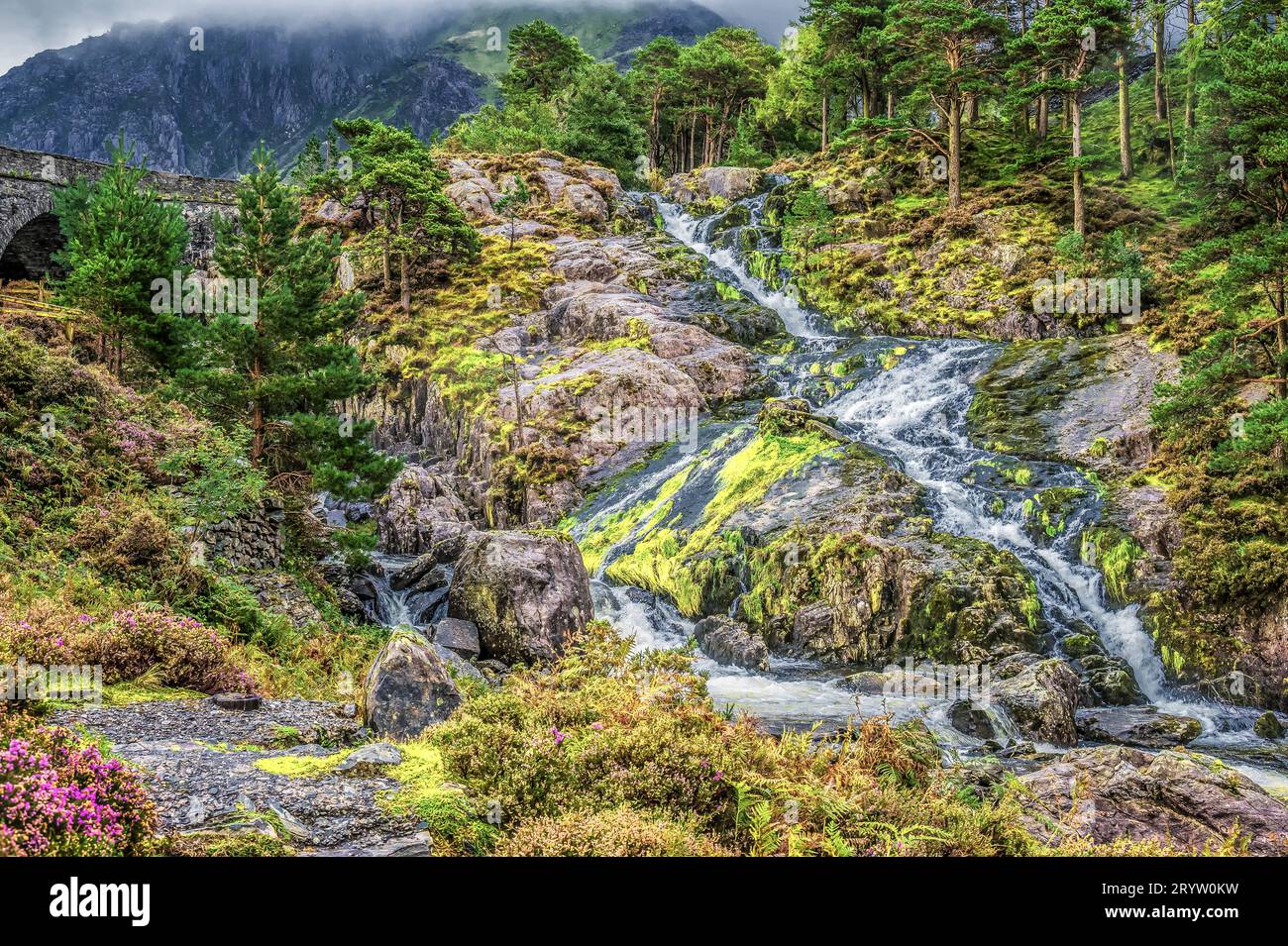 The image is of Ogwen waterfalls at the foot of the Ogwen valley in ...