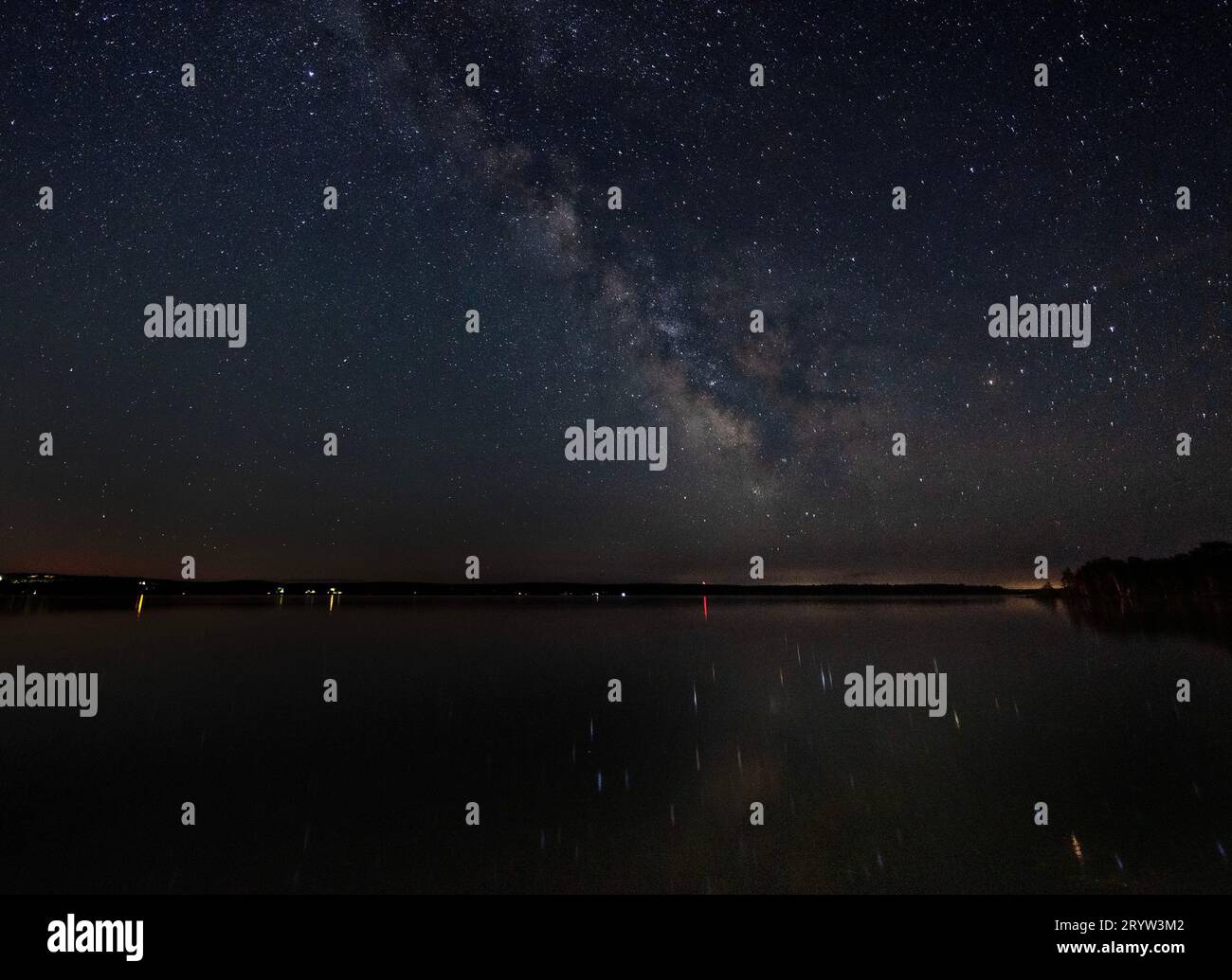 A spectacular view of a tranquil lake, illuminated by the luminous ...