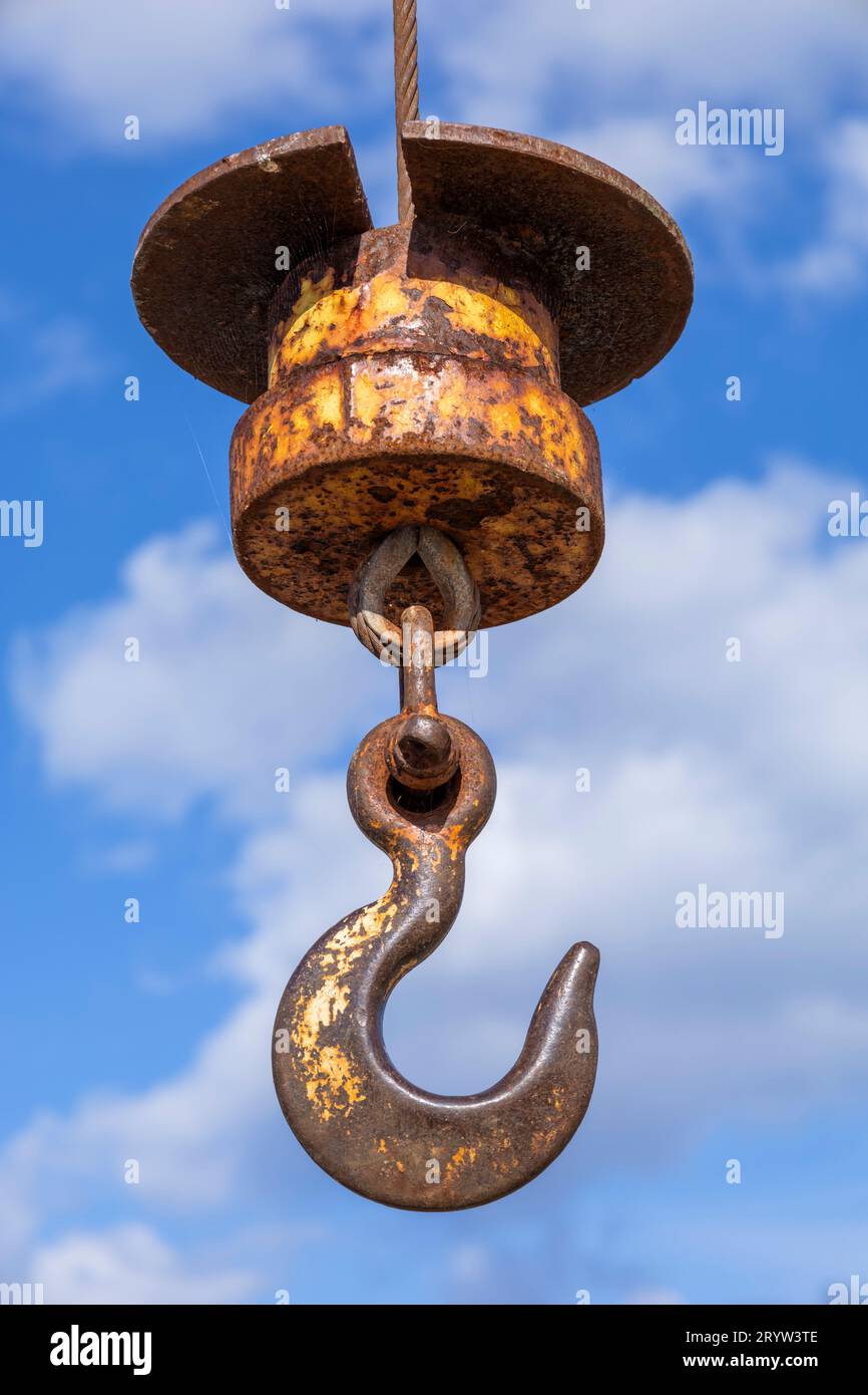A large crane lifting hook in Whitby harbour, North Yorkshire, UK Stock ...