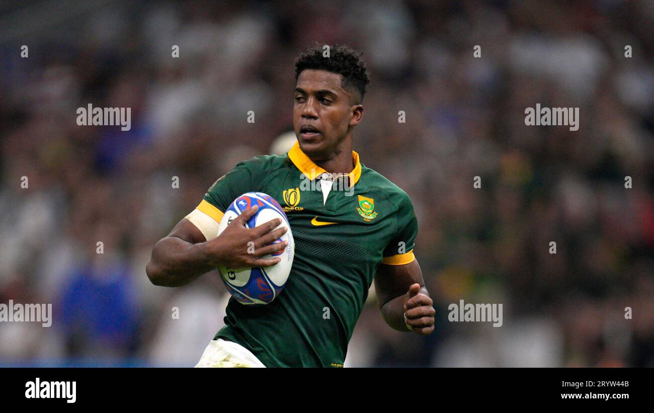 South Africa's Canan Moodie runs with the ball to score a try during ...