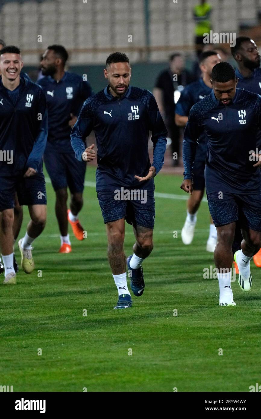 Saudi Arabia's Al Hilal Neymar, center, and his teammates warm up ...