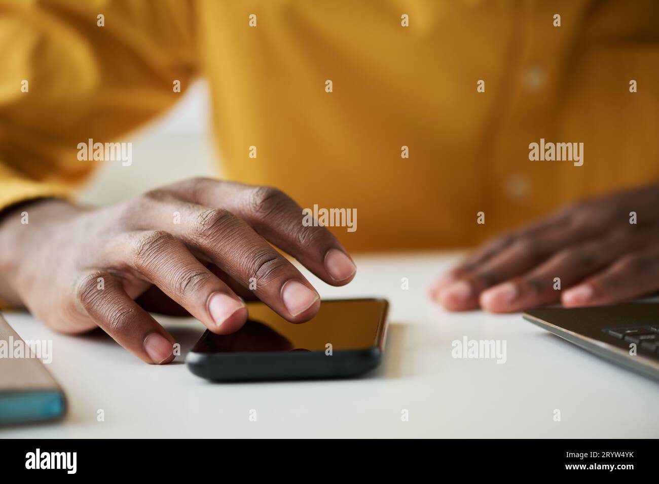 Focus on fingers of right hand of young male office worker over ...