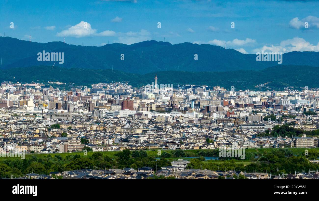 Aerial view of downtown Kyoto, sunny day in Japan - Telephoto, drone ...