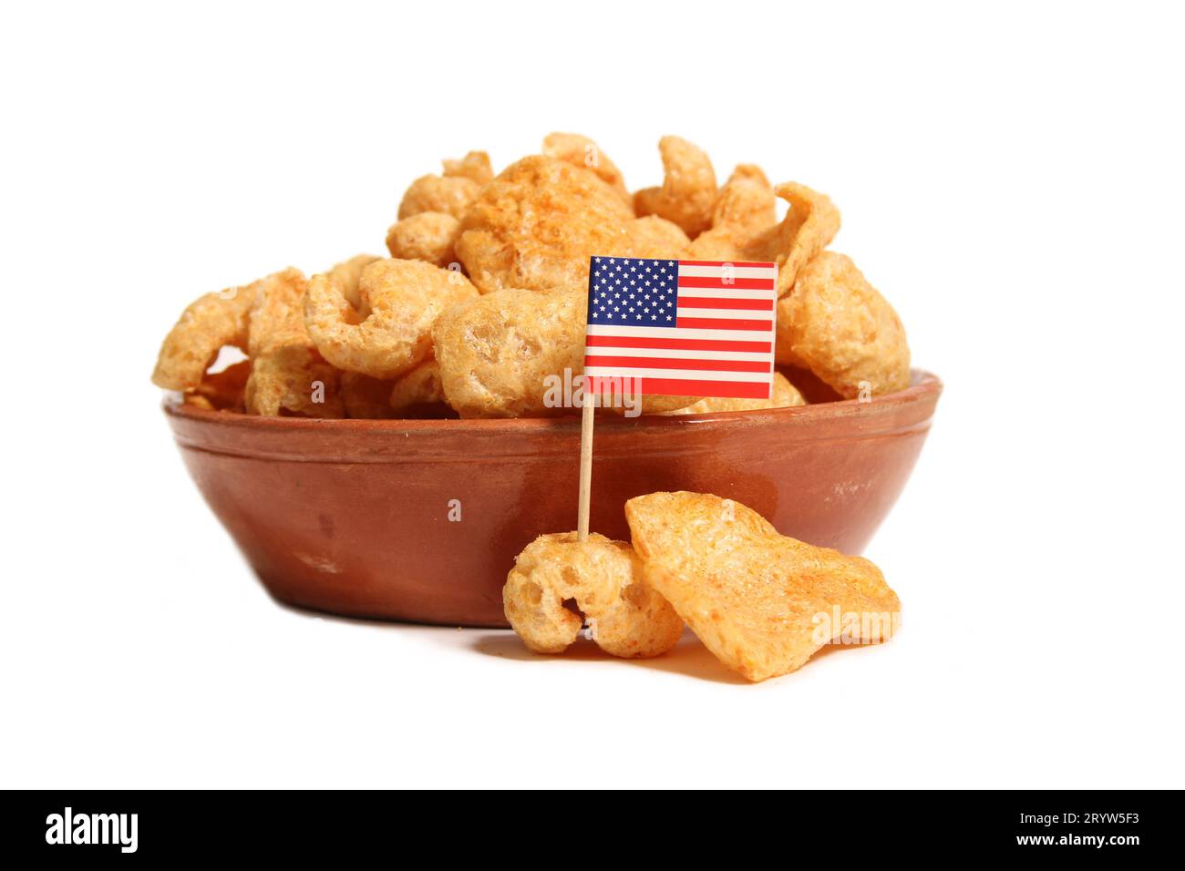 A white ceramic bowl filled to the brim with golden-brown chicken ...