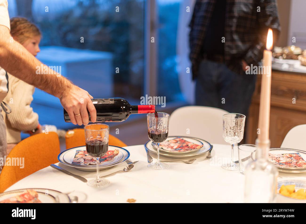 Group friends gathered around table hi-res stock photography and images ...