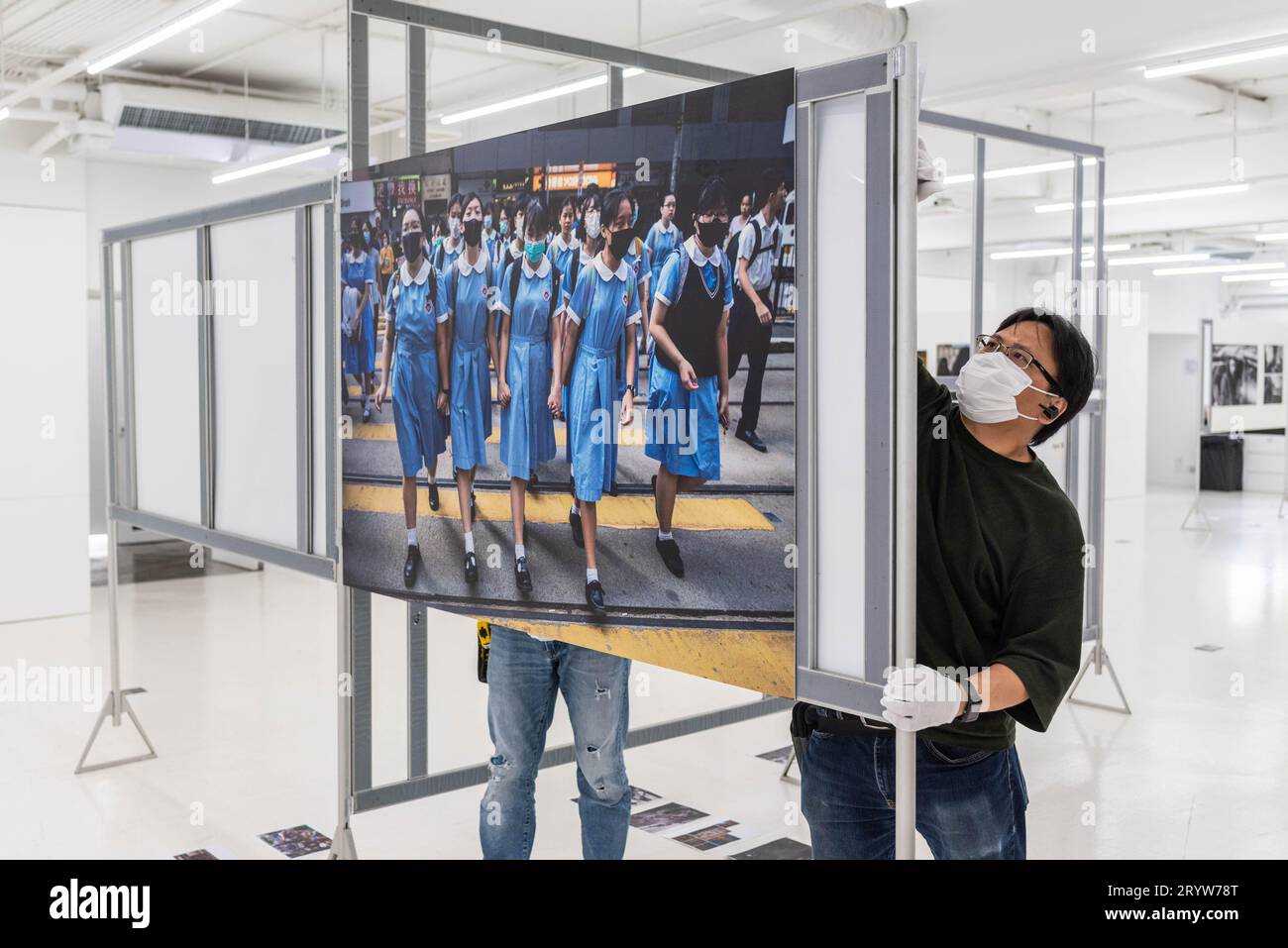 A worker tries to set up the World Press Photo Exhibition. The 2020 ...