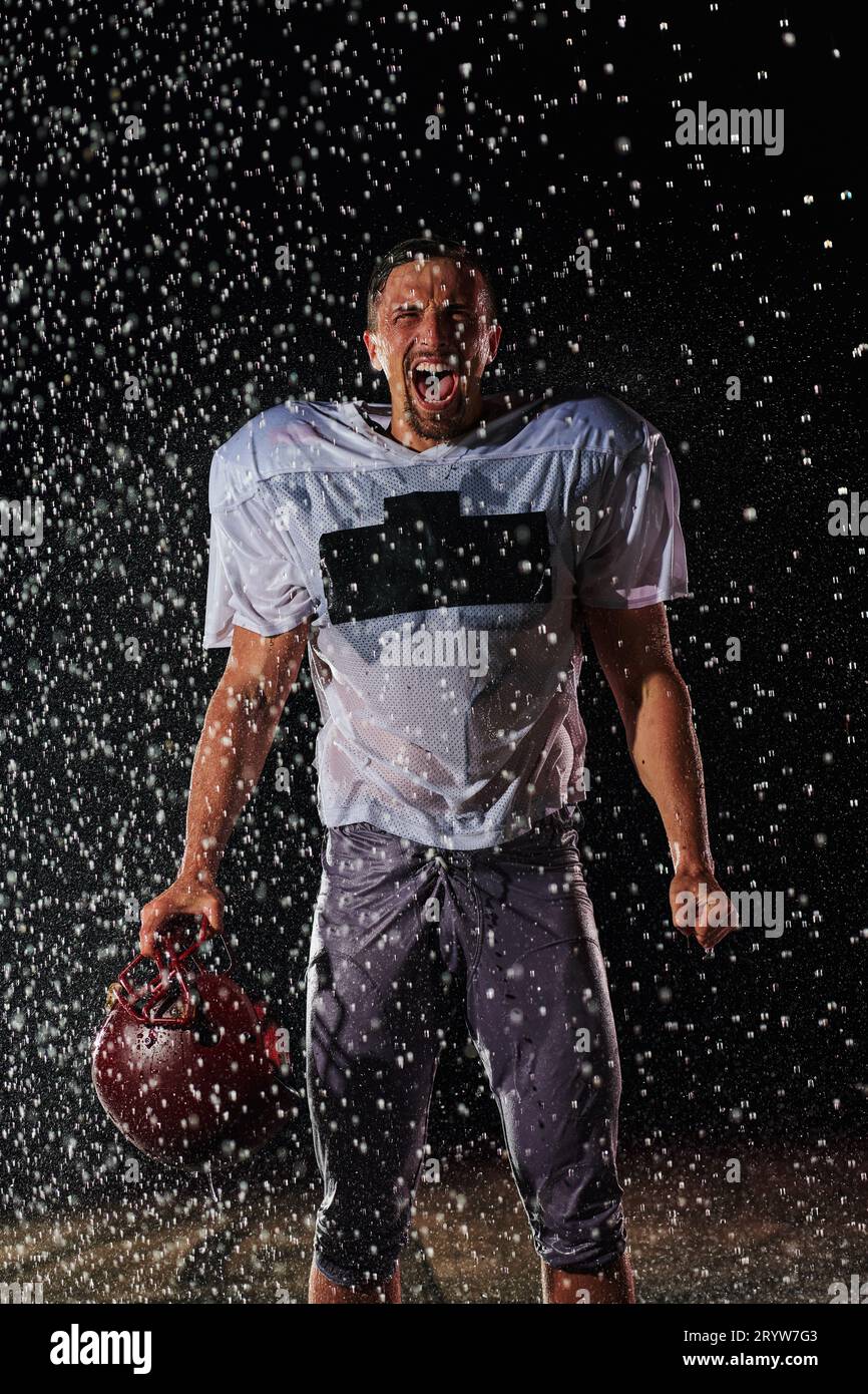 American Football Field: Lonely Athlete Warrior Standing on a Field ...