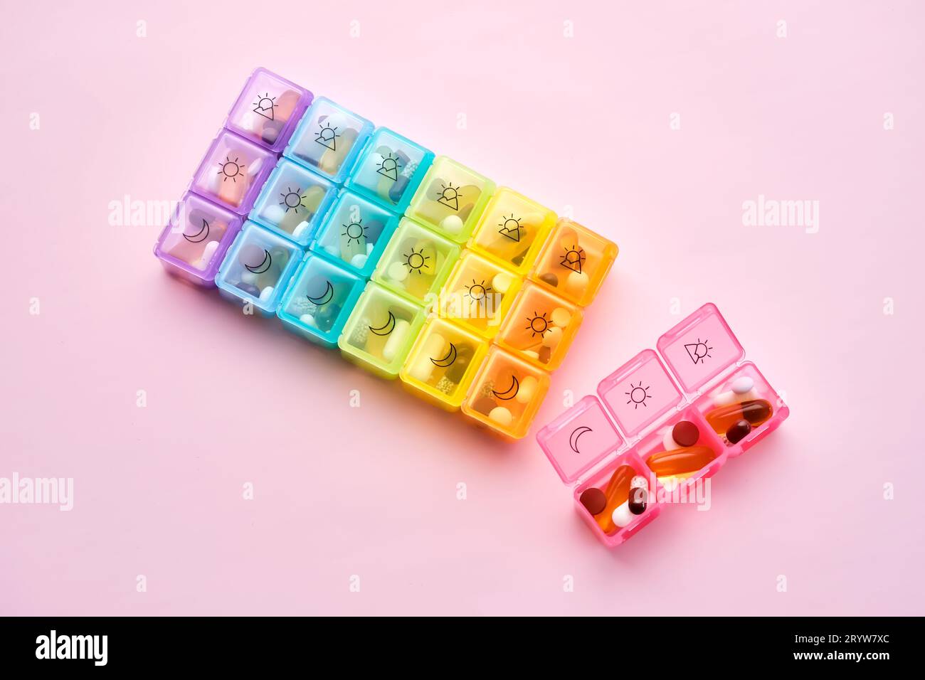 Bright pill box with different pills and vitamins Stock Photo - Alamy