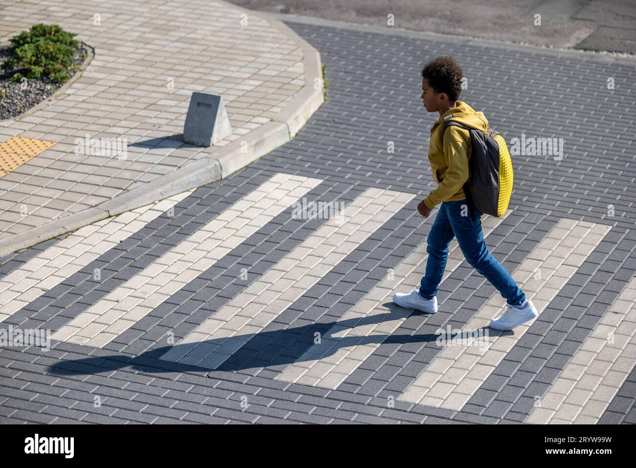 African american schoolboy crossing hi-res stock photography and images ...