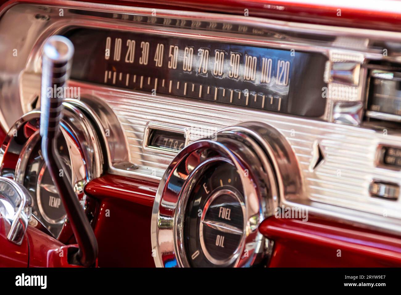 The interior of a 1957 Pontiac Star Chief in red and white color scheme ...