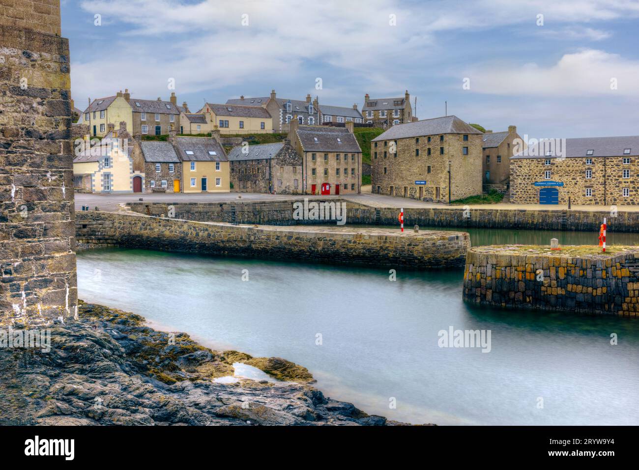 Historic fishing harbour and traditional fishermen's cottages in ...