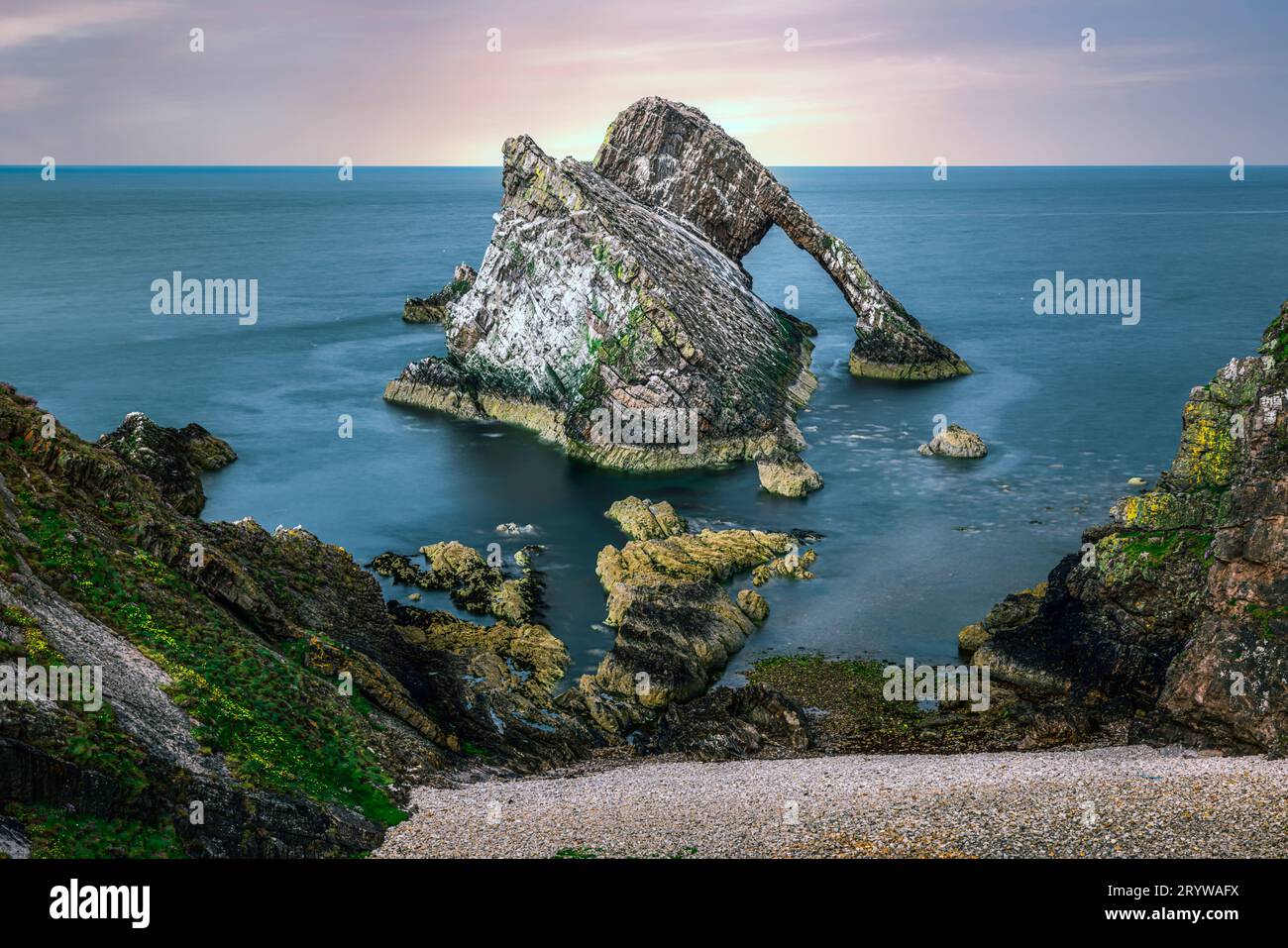 The sea stack Bowfiddle Rock near Portknockie in Moray, Scotland Stock ...