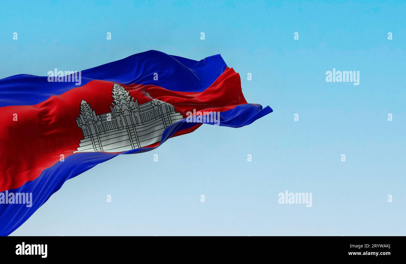 Cambodia national flag waving on a clear day. Three bands, blue, double ...
