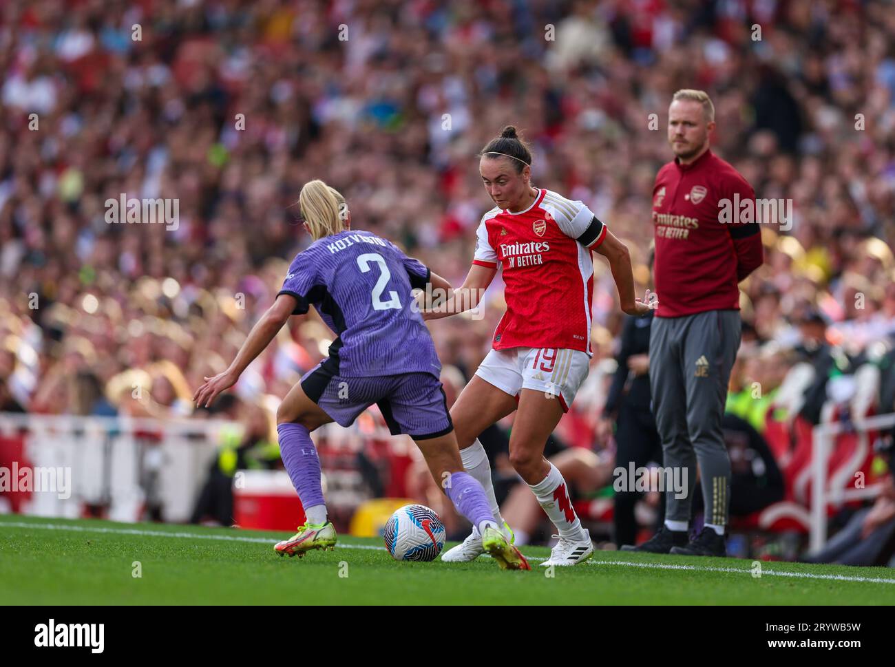 Arsenal's Caitlin Foord (right) and Liverpool's Emma Koivisto battle ...