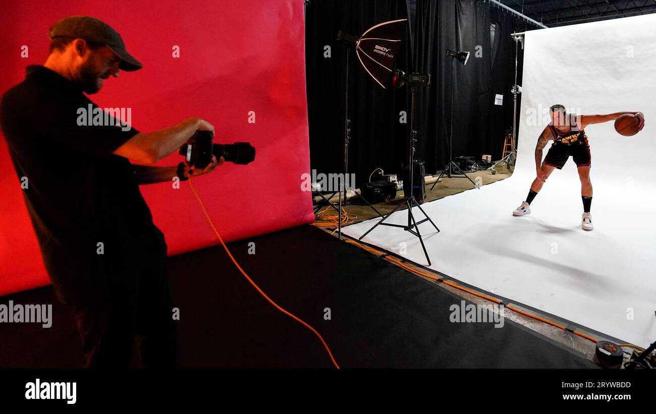 NBA Photos photographer Adam Hagy works with Atlanta Hawks Garrison ...