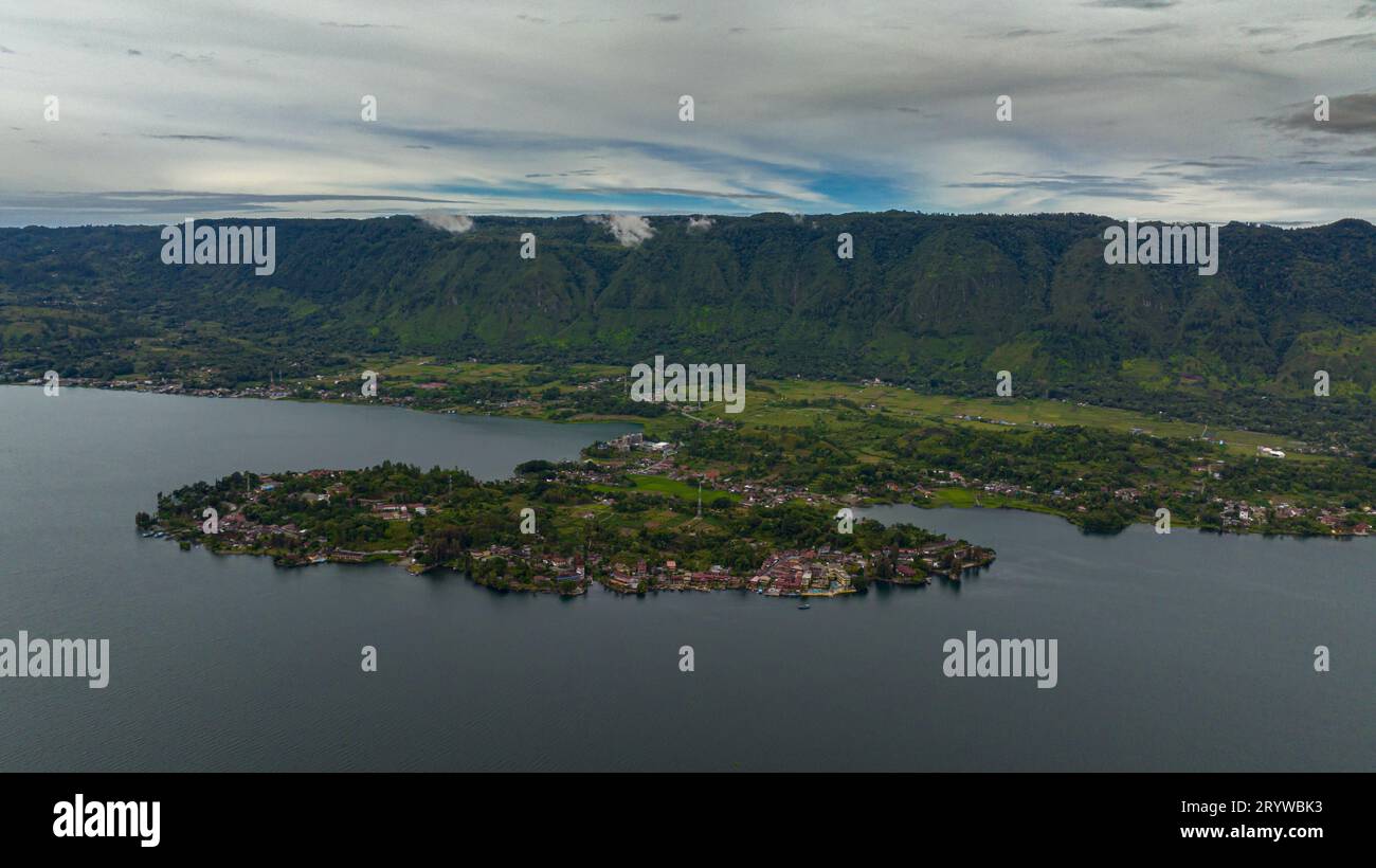Tourist spot Tuk Tuk on Lake Toba and the coast of Samosir Island ...