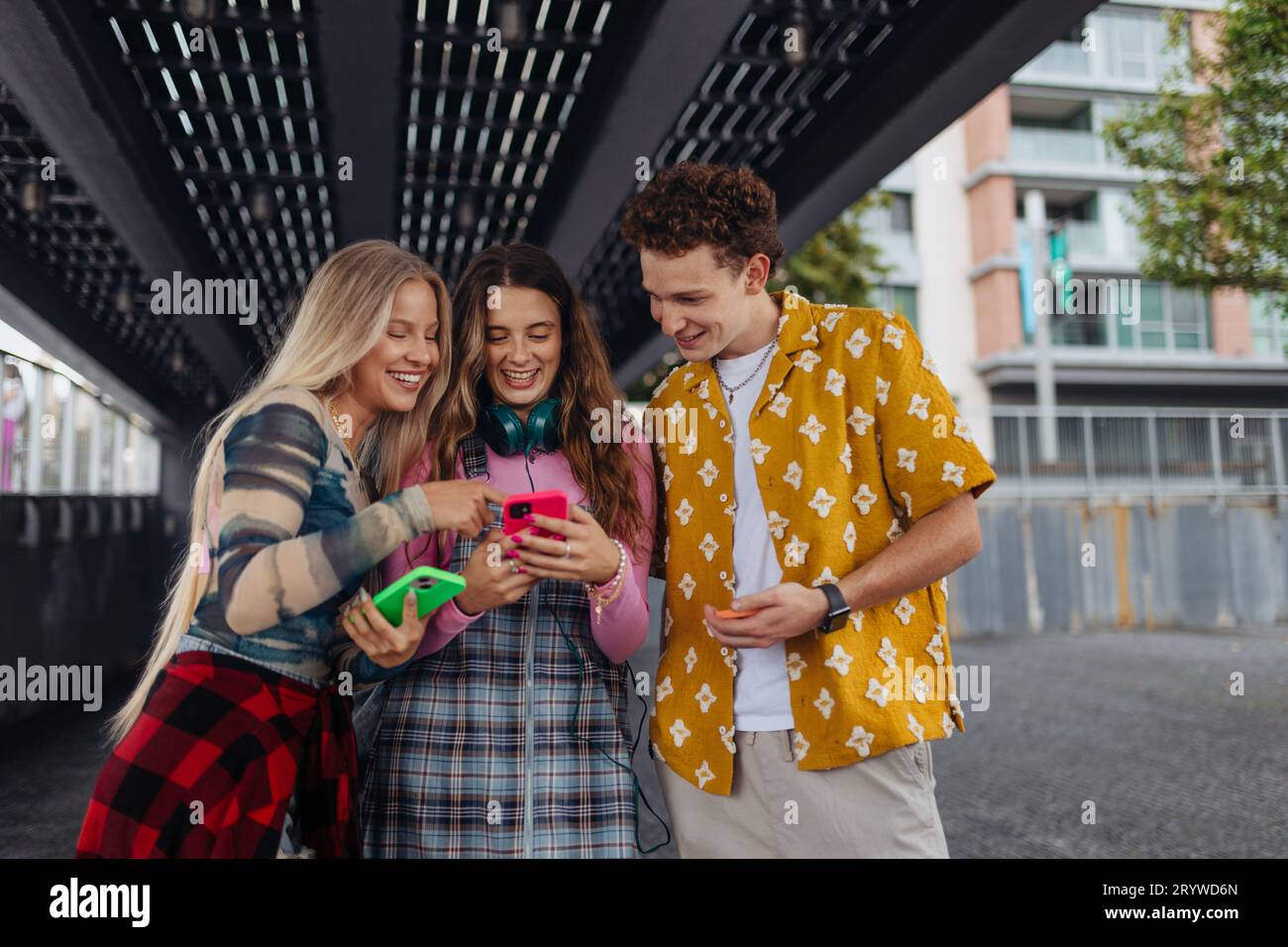 Generation z students hanging out together outdoors in the city Stock ...