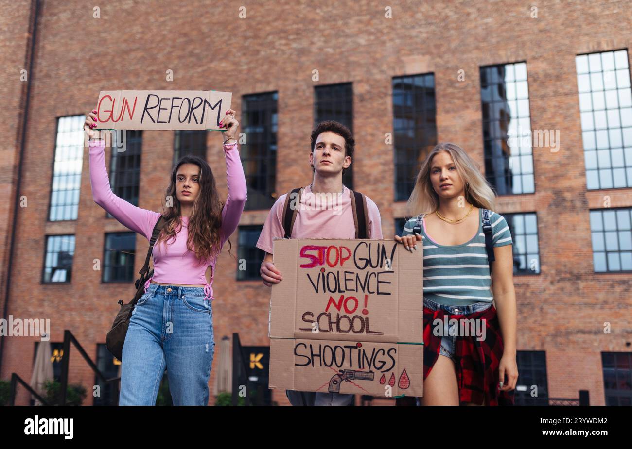 Generation Z activists with banners protesting on the street Stock ...