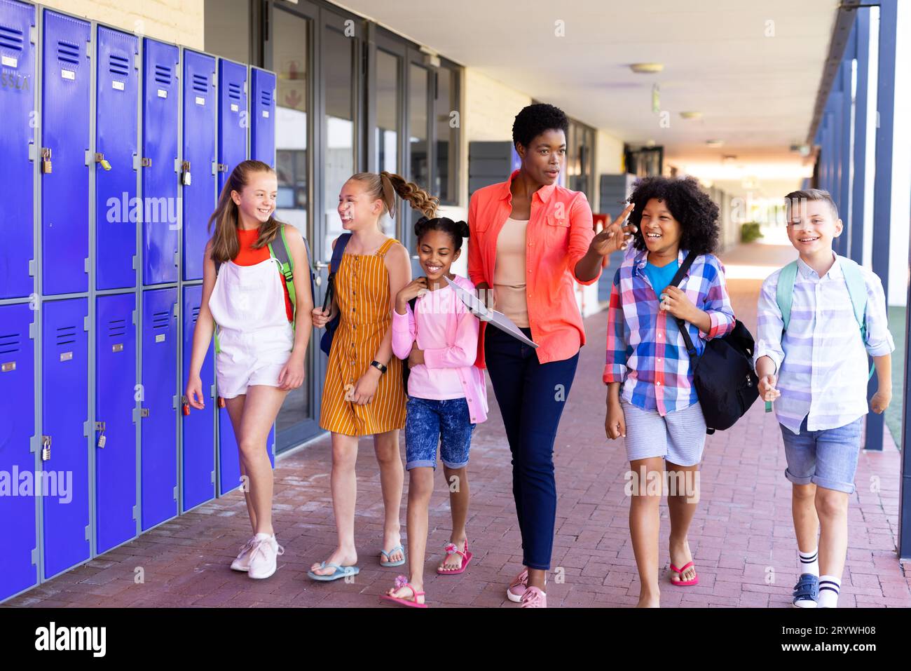 School children teacher walking in hi-res stock photography and images - Alamy
