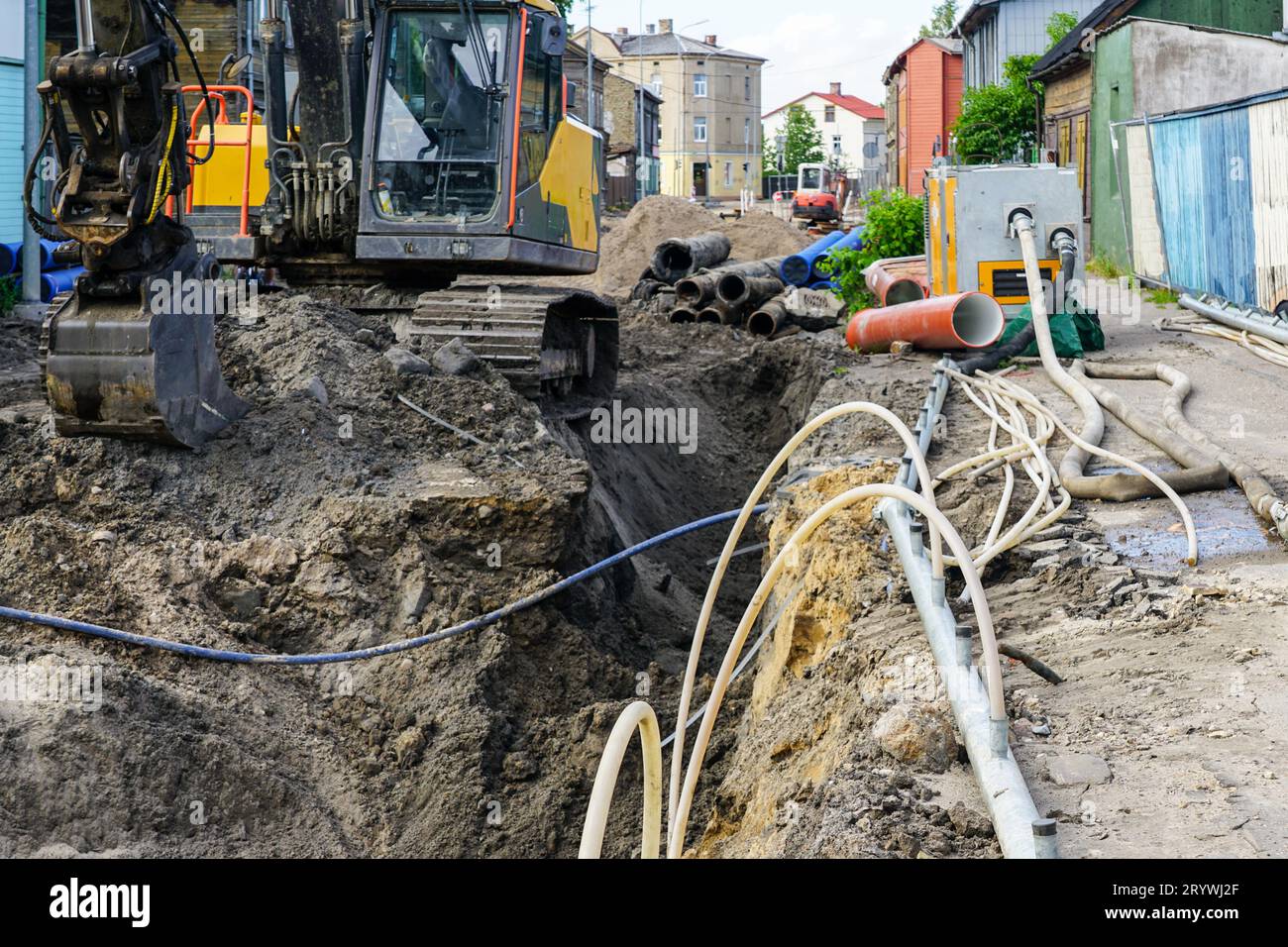 Street reconstruction view, deep trench, dewatering system, new and old ...