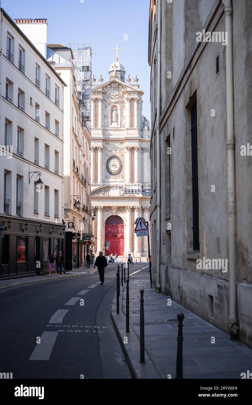 A vibrant scene of a typical European street is depicted in this image ...