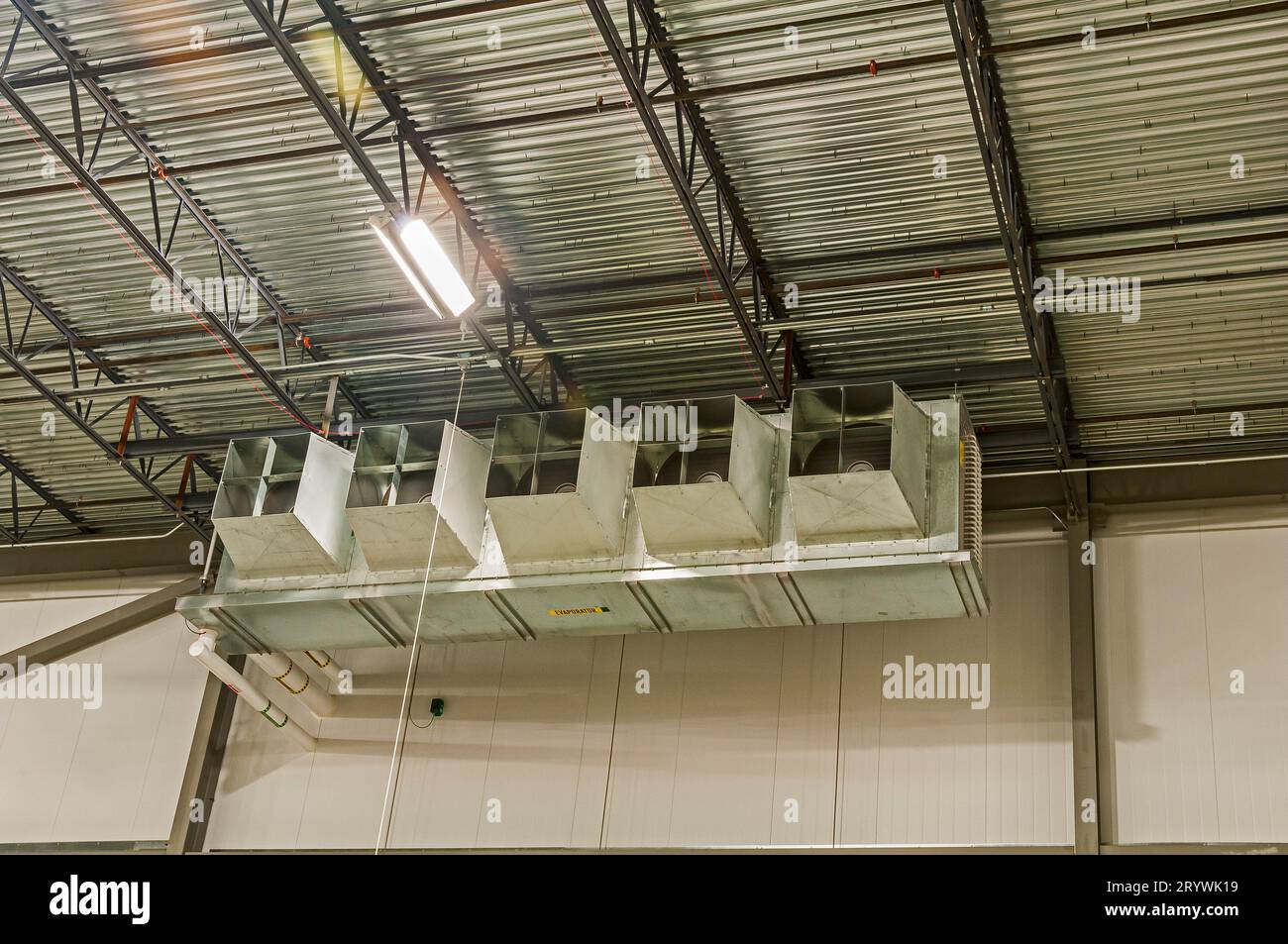 A five-fan industrial refrigeration evaporator fan at an ammonia-cycle ...
