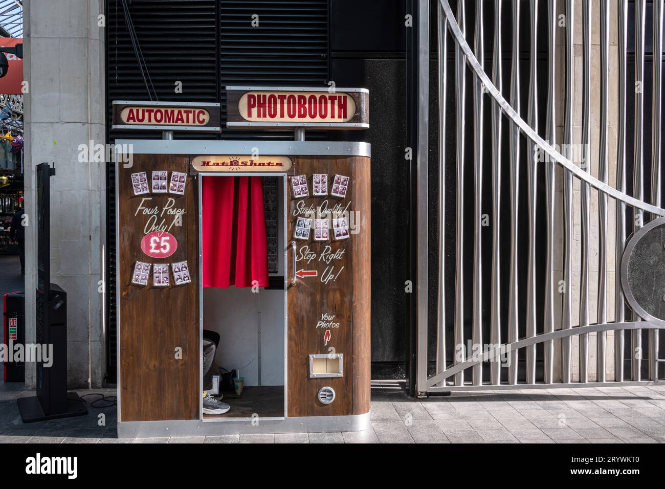 A Hot Shots photo booth in use in Old Spitalfields Market in London E1 ...