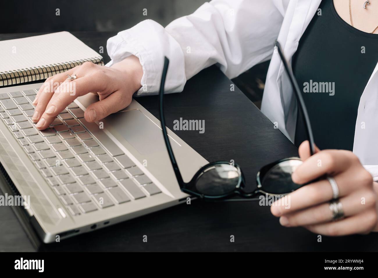 Productive Work Environment. Female Hands Typing on Laptop Keyboard ...